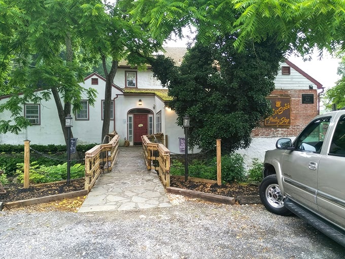 The charming exterior of Butterscotch Pastry Shop feels like stumbling upon a secret clubhouse for carb enthusiasts. The wooden footbridge practically whispers, "Worthy treats await."