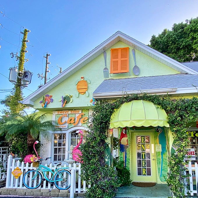The lime-green cottage with giant silverware and tropical flair isn't just eye-catching—it's practically screaming "amazing brunch inside!" at passing motorists on Gulf Boulevard.