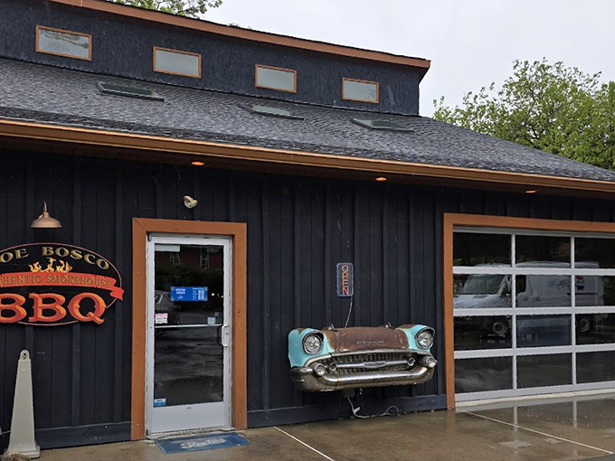 The blue exterior with vintage car trim isn't just eye-catching—it's a smoke signal to BBQ pilgrims that they've reached the promised land of pork.