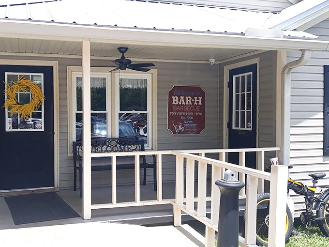 The unassuming exterior of Bar-H Barbecue stands like a beacon of hope for hungry travelers. No fancy frills, just the promise of smoky deliciousness inside.