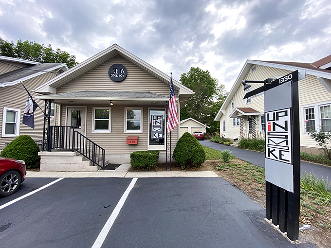 The longhorn logo above this unassuming tan house is like a smoke signal to barbecue lovers – something magical is happening inside Up In Smoke BBQ.