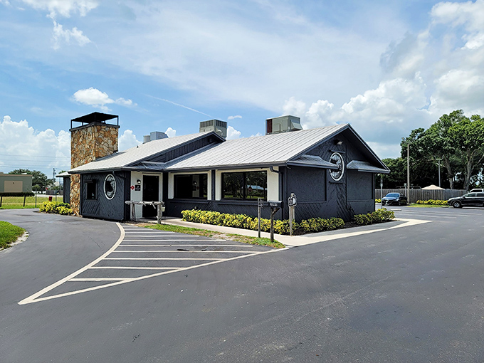 The unassuming exterior of Moonswiners Bar-B-Q stands like a smoke signal to hungry travelers—proof that the best BBQ joints often hide in plain sight.