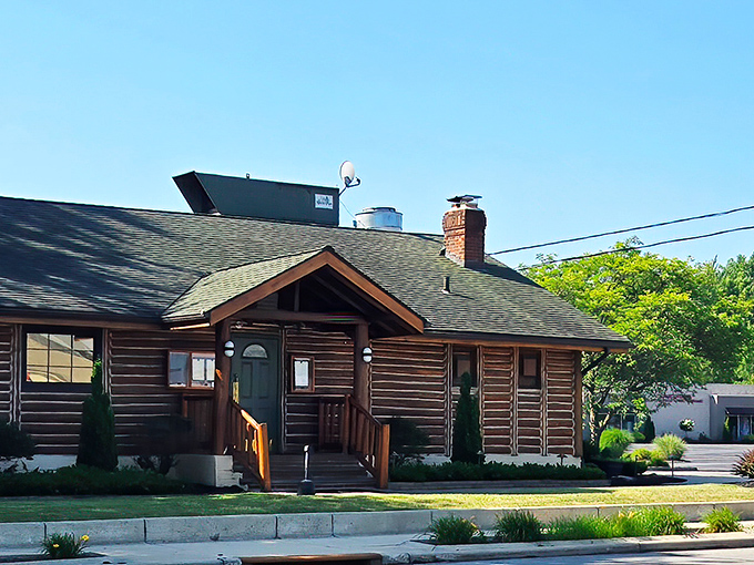 The log cabin exterior of Cabin Club isn't just charming—it's a culinary plot twist in suburban Westlake. Like finding Thoreau's cabin, but with much better food.