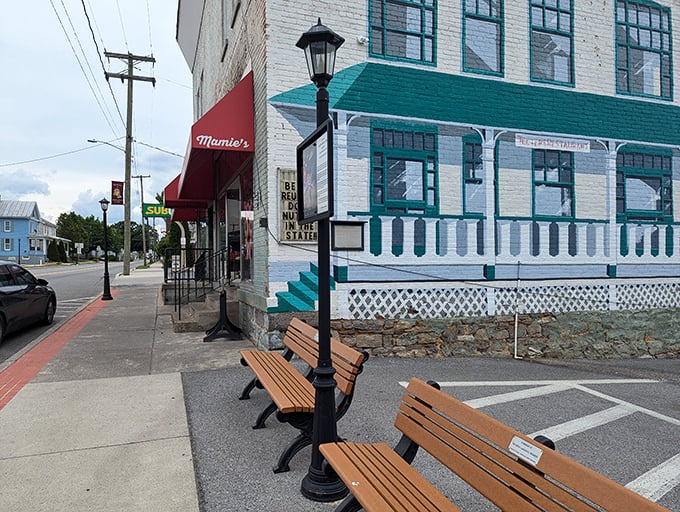 The unassuming white brick exterior of Mamie's Café & Bakery stands like a humble guardian of culinary treasures. Small-town charm with big-time flavor awaits inside.