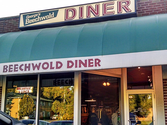 That iconic turquoise awning isn't just eye-catching—it's a beacon for breakfast pilgrims seeking omelet salvation in Columbus.