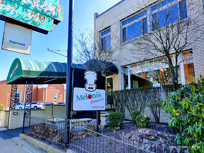 The unassuming brick exterior of Meloni's might not stop traffic, but locals know this modest façade hides culinary treasures that have satisfied Uniontown appetites for generations.