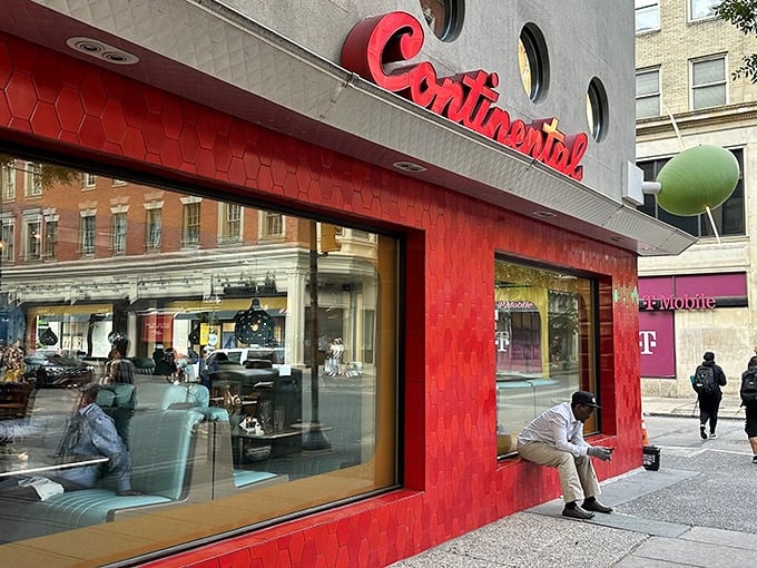 The Continental's iconic red exterior and giant martini olive sculpture announce that something special awaits inside this Philadelphia hotspot.