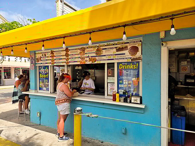 That turquoise paint job isn't just a color choice – it's a beacon calling hungry souls to seafood salvation.