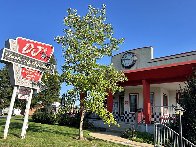 The classic neon sign beckons like a time portal to simpler days. DJ's red and white exterior promises nostalgic delights within.