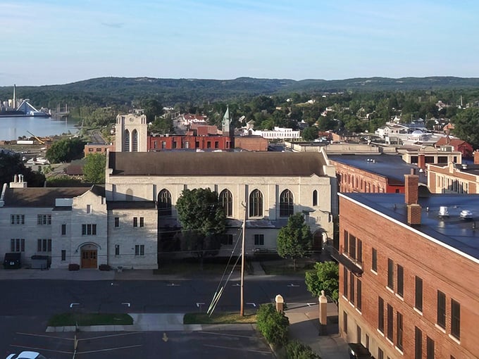Historic charm meets small-town warmth on Marquette's Washington Street, where sandstone buildings whisper stories of the past while housing today's vibrant businesses.