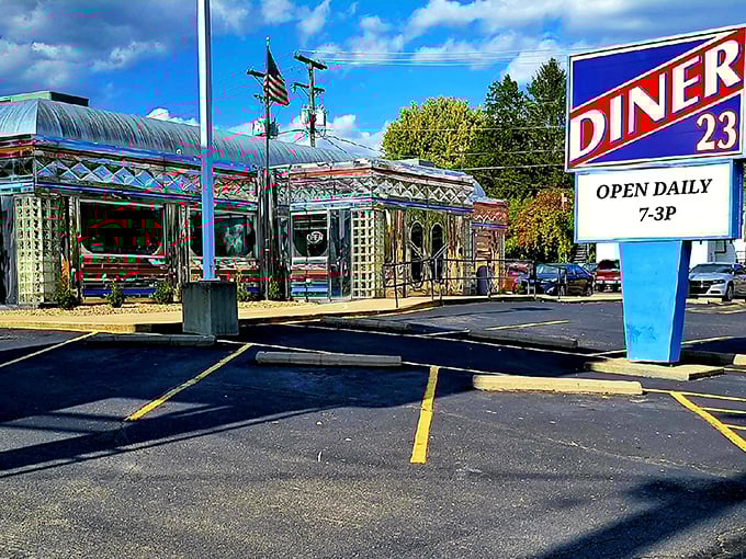 The gleaming stainless steel exterior of Maddy's Diner 23 shines like a beacon of hope for hungry travelers. This classic American diner promises nostalgic comfort in every bite.