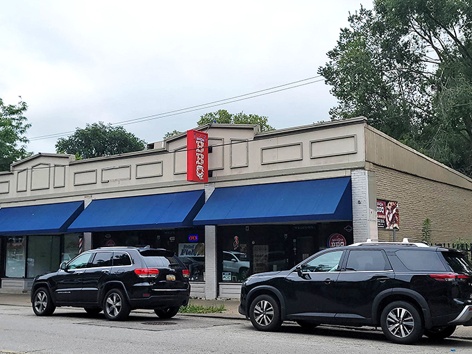 The unassuming storefront with blue awnings might not scream "food paradise," but locals know better—culinary treasures often hide in plain sight.