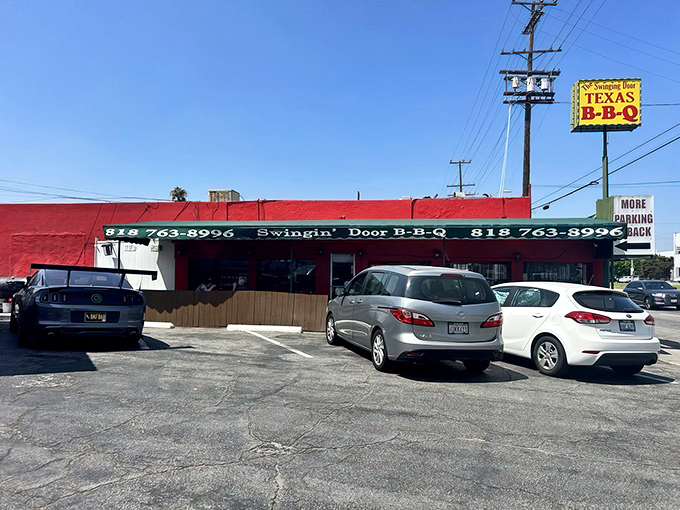 The bright red exterior with yellow accents isn't trying to be fancy—it's saving all that energy for what matters: the meat inside.
