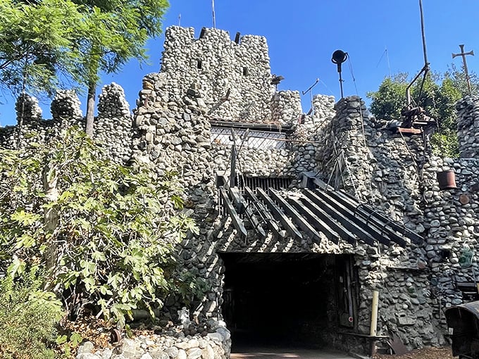 Stone towers rise against the California sky like medieval sentinels guarding a suburban kingdom. Who needs European castles when Glendora has this masterpiece?