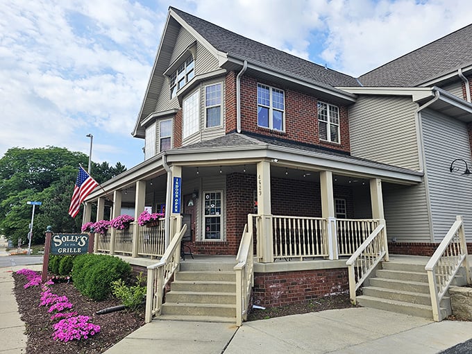 Solly's Grille stands proudly in its charming brick building, complete with a welcoming front porch that practically whispers, "Come in, loosen your belt, stay awhile."