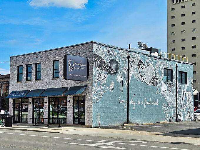 The blue-gray brick building with its striking botanical mural isn't just eye-catching—it's a beacon of hope and really good avocado toast in downtown Columbus.