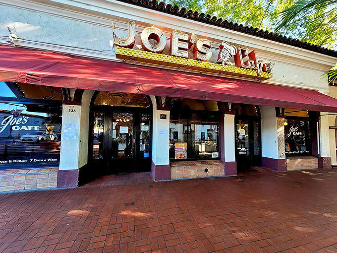 The iconic red awning and vintage neon sign of Joe's Café stand as a time capsule on Santa Barbara's State Street, beckoning hungry patrons since long before Instagram made food famous.