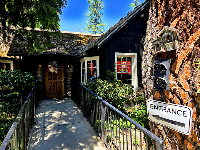 The entrance to Mac's beckons like a woodland fairy tale—rustic charm with an "ENTRANCE" sign that leaves no room for confusion.