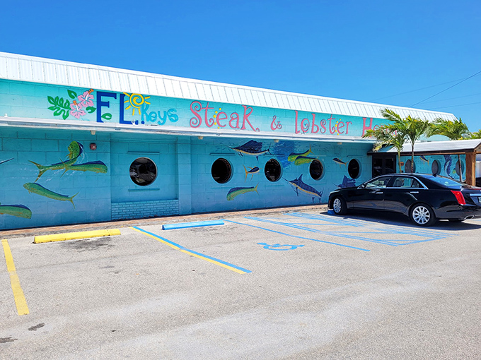 The turquoise exterior isn't just Florida kitsch—it's a maritime beacon for hungry travelers, complete with porthole windows and hand-painted sea creatures swimming across the façade.