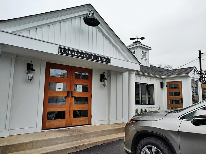 The pristine white exterior with wooden doors isn't just inviting—it's practically whispering "breakfast nirvana awaits inside" to hungry Malvern passersby.