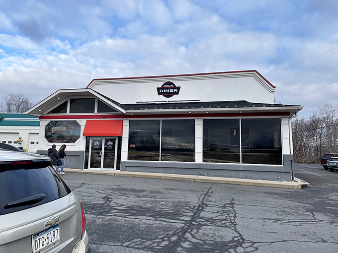 The unassuming exterior of Fairlane Village Diner hides culinary treasures within. Like finding a diamond in a parking lot—complete with classic diner charm.