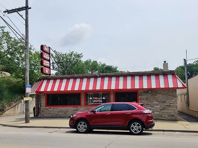That iconic red and white awning isn't just eye-catching—it's a beacon of breakfast hope for hungry Elgin residents seeking hash brown salvation.