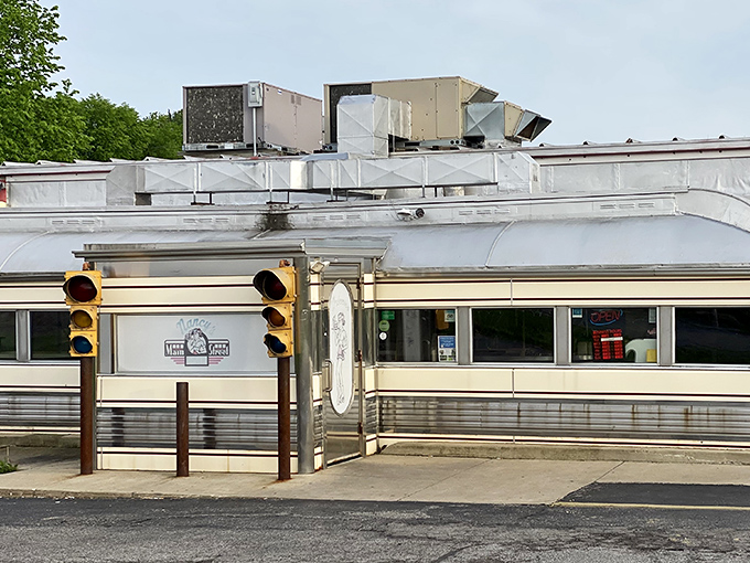 Nancy’s Main Street Diner shines in polished steel and retro charm, complete with old traffic lights that signal a delicious trip back in time.
