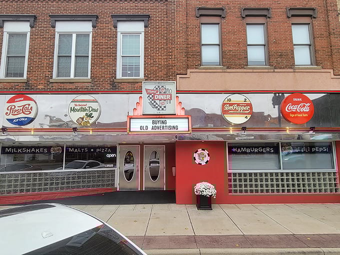 The classic brick façade and vintage signage of Mom's Diner & Pizzeria stands as a time capsule on Archbold's main street, beckoning hungry travelers with nostalgic charm.