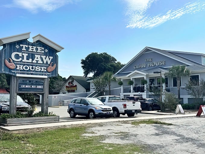 The white clapboard exterior of The Claw House stands like a beacon of seafood salvation against the Carolina blue sky, promising delicious treasures within.