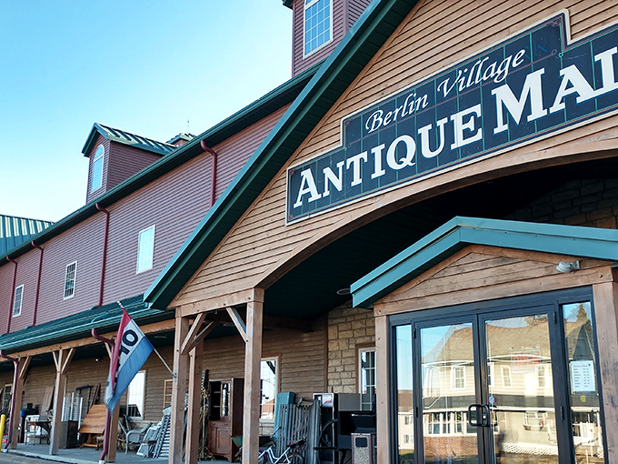 The distinctive red building with its green roof stands like a beacon for treasure hunters in Amish Country. Classic barn-inspired architecture houses countless memories waiting to be rediscovered.