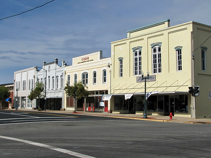 Historic charm meets small-town affordability in downtown Quincy, where that vintage Coca-Cola mural isn't just decoration—it's a nod to the town's fascinating financial history.