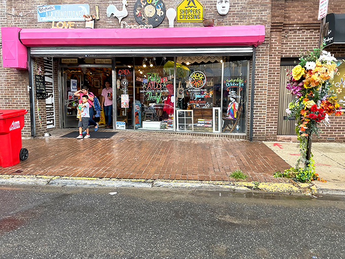 The hot pink awning serves as a beacon of hope and bargain hunting on South 5th Street, where shopping and social good collide in colorful harmony.
