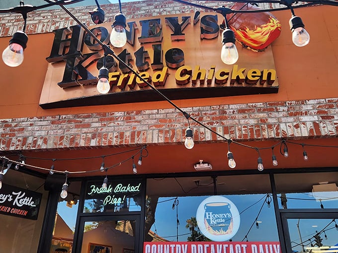The unassuming brick facade of Honey's Kettle hides culinary greatness within, like finding a Picasso at a yard sale.
