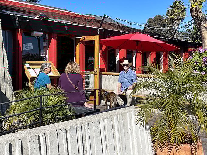 The vibrant bougainvillea framing Santa Barbara FisHouse's entrance isn't just pretty—it's nature's way of saying "seafood paradise ahead!"