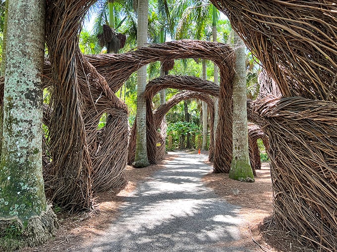 Patrick Dougherty's woven stick archways transform ordinary paths into portals to another dimension. Nature's architecture at its most whimsical.