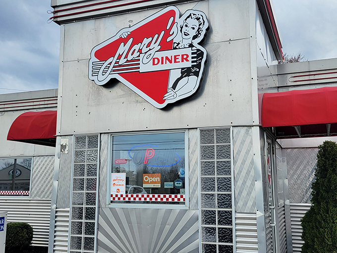 That iconic red and white sign isn't just welcoming you to a meal—it's inviting you to step back in time. Pure Americana awaits inside.