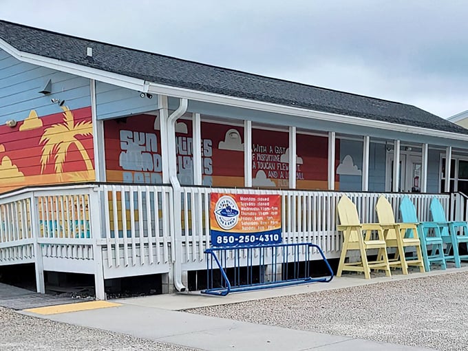 The cheerful blue exterior of LongBill's with its vibrant sunset mural practically screams "fresh seafood inside!" Those colorful Adirondack chairs are calling your name.