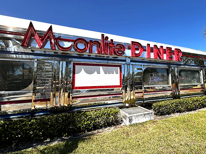 That gleaming silver exterior with bold red lettering isn't just eye-catching—it's a time portal to when Elvis was king and milkshakes were breakfast food.