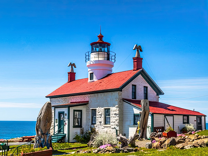 The quintessential lighthouse fantasy come to life—white walls, red roof, and that perfect perch above the Pacific. New England charm with a California address.