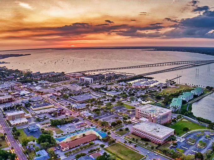 Aerial dreams come true! Charlotte Harbor stretches like a blue carpet beneath Punta Gorda's charming grid of streets, promising waterfront living without the South Beach price tag.