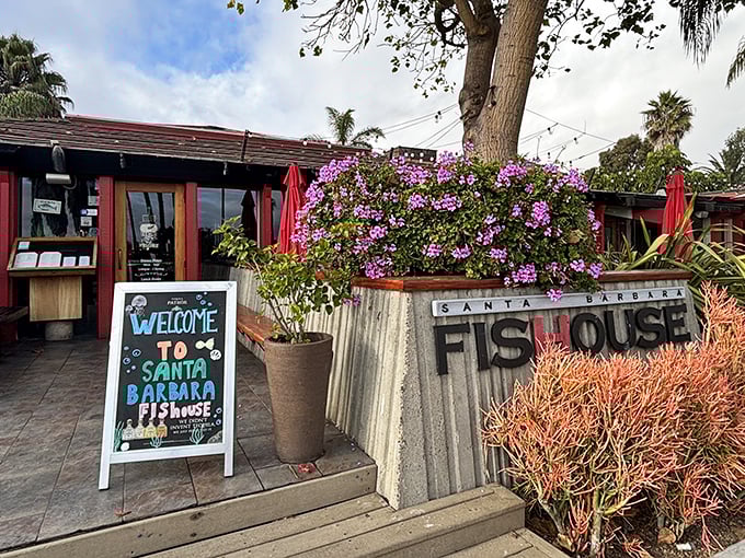 The vibrant bougainvillea framing Santa Barbara FisHouse's entrance isn't just pretty—it's nature's way of saying "seafood paradise ahead!"