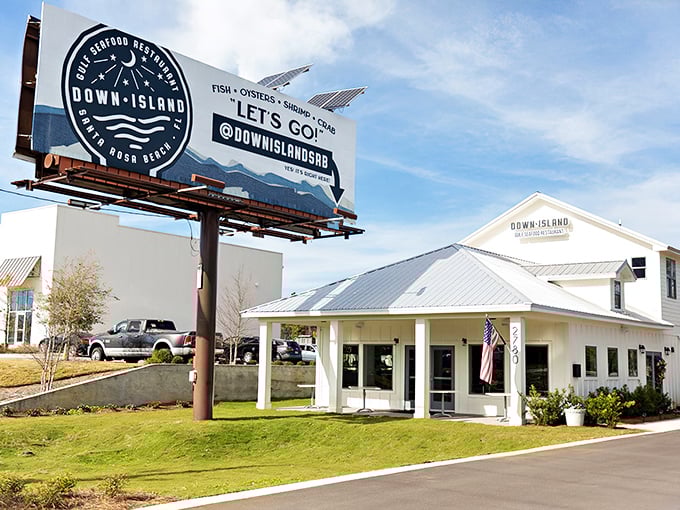 A coastal dream in white and blue, Down Island's exterior promises seafood adventures with its crisp architecture and welcoming porch.