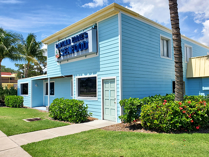That charming turquoise facade hides Florida's best-kept seafood secret – trust the locals on this one.