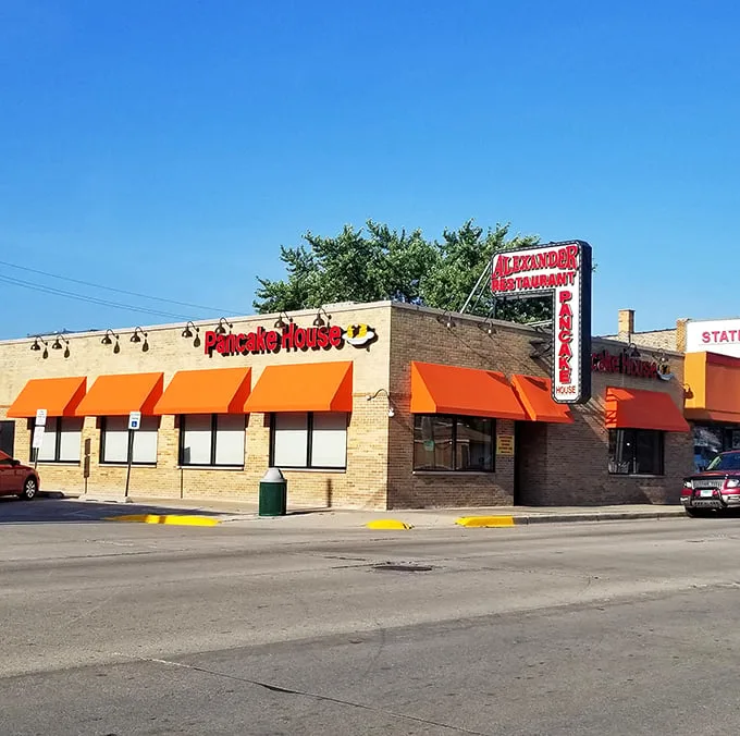 Those iconic orange awnings aren't just eye-catching—they're beacons of breakfast bliss calling to hungry souls across Stickney like a pancake lighthouse.