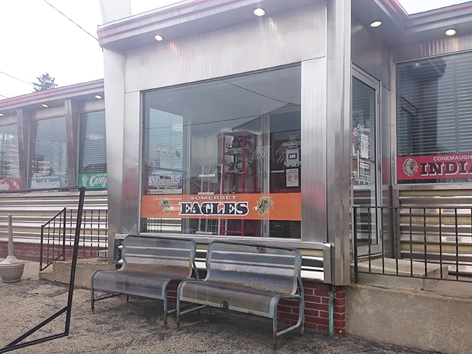 Classic American diner architecture at its finest - chrome, glass, and that timeless appeal that never goes out of style.