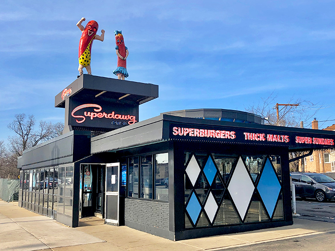 Those iconic hot dog mascots on the roof aren't just waving – they're beckoning you into a time capsule of Chicago culinary history.