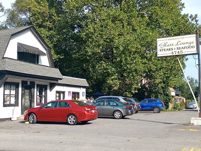 The unassuming exterior of Glass Lounge in Harrisburg hides culinary treasures within. Classic white building, modest signage—the perfect disguise for burger greatness.