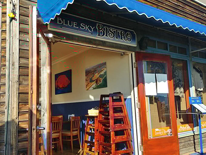 Blue Sky Bistro's weathered exterior whispers promises of culinary treasures hiding behind those welcoming doors.