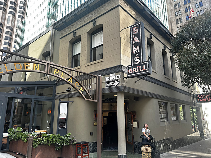 Sam's Grill stands like a time capsule amid San Francisco's skyscrapers, its neon sign a beacon for seafood lovers since long before Instagram existed.