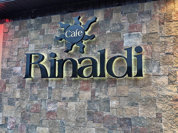 Café Rinaldi's stone façade and copper awnings stand like a culinary lighthouse on Old Forge's main drag, beckoning pizza pilgrims from across Pennsylvania.